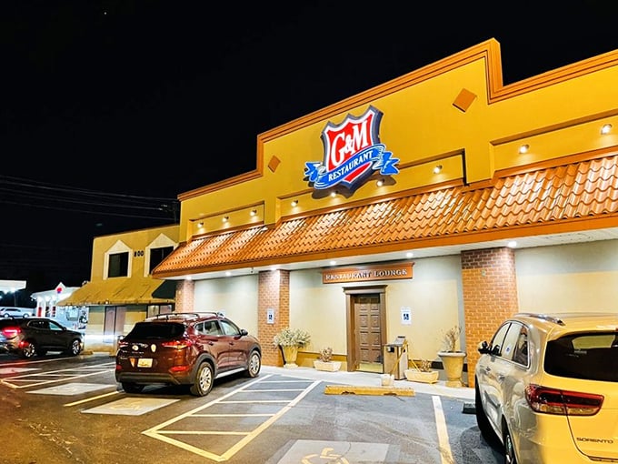 The unassuming exterior of G&M Restaurant hides culinary treasures within, like a delicious secret waiting behind that distinctive blue shield logo.