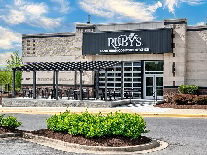Ruby's glows like a beacon of Southern promise against the night sky, beckoning hungry travelers with its sleek exterior and warm lighting.