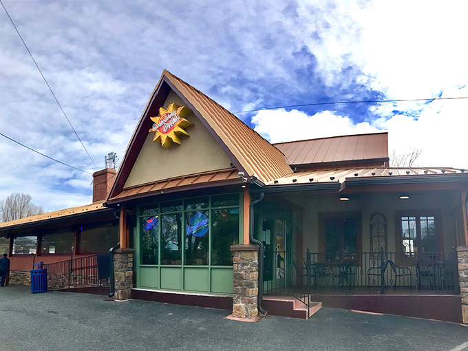 The unassuming exterior of Sunshine Grille hides culinary treasures within, like a breakfast speakeasy with that distinctive copper roof signaling "good things ahead."