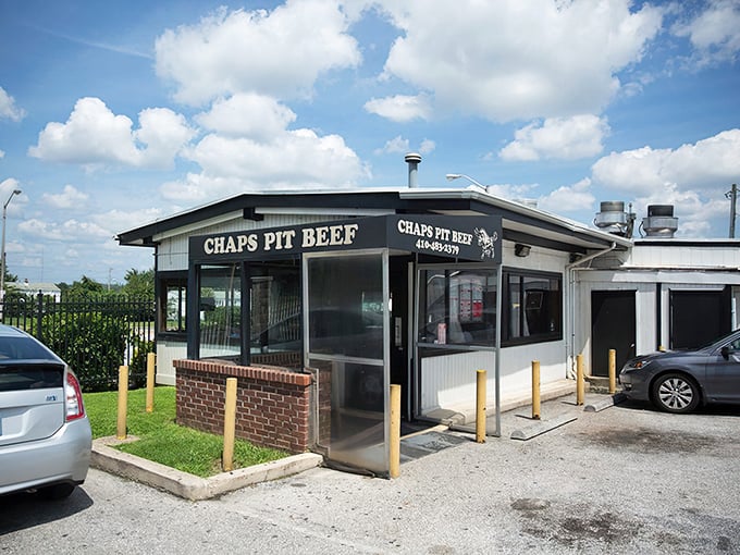 The unassuming exterior of Chaps Pit Beef &ndash; proof that culinary greatness often hides in plain sight, like a superhero's secret identity.