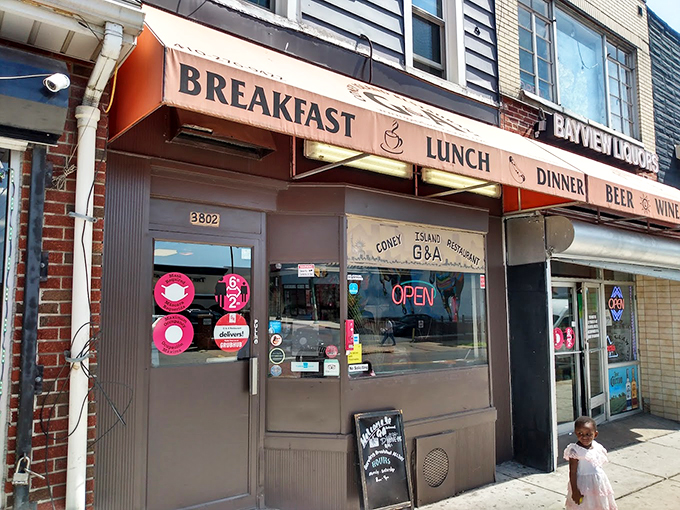 The orange awning of G&A Restaurant stands like a beacon of comfort food, promising breakfast, lunch, dinner, and the simple joy of a cold beer after a long day.