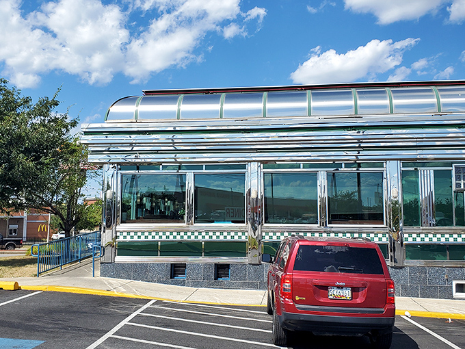 The silver glow of Broadway Diner's exterior is like a lighthouse for hungry travelers, promising comfort and satisfaction just off Eastern Avenue.