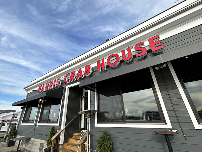 Harris Crab House, where the azure sky transforms this waterfront gem into a postcard-worthy scene that whispers, "Come for dinner, stay for the view."