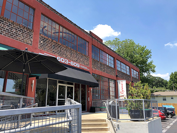 The unassuming red brick exterior of Cyrano's Cafe stands like Clark Kent before transformation &ndash; no cape needed, just carrot cake within.