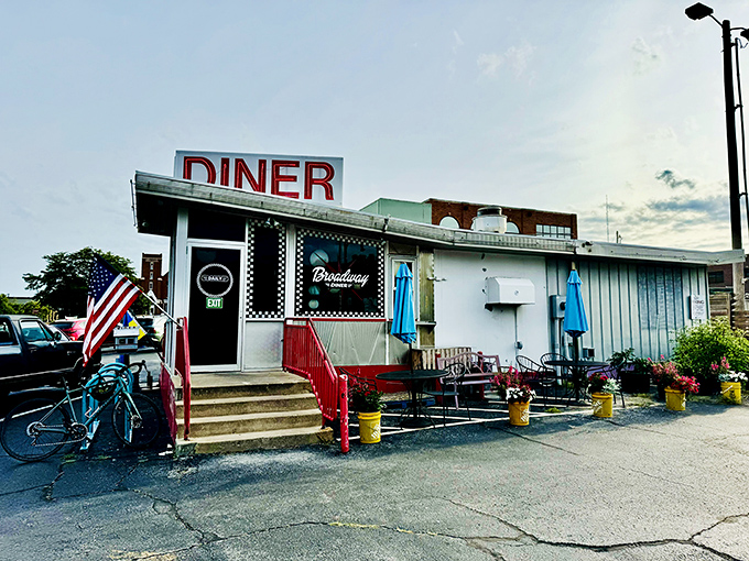 The iconic exterior of Broadway Diner beckons with its retro charm and unmistakable red "DINER" sign&mdash;a Columbia landmark where breakfast dreams come true. 