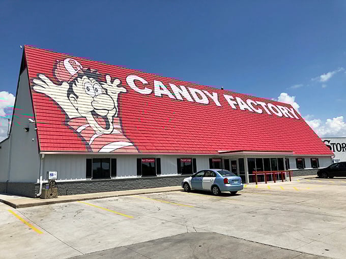 A candy lover's beacon on I-44, Redmon's iconic red roof and cartoon mascot promise sweet salvation just minutes from your sensible driving schedule.