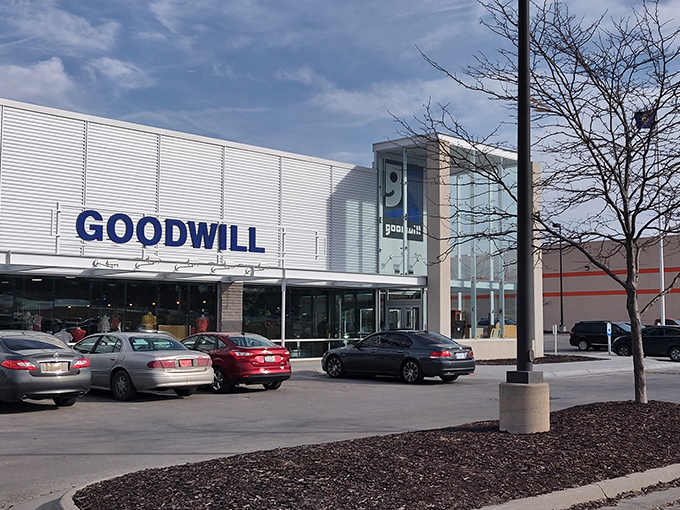 The modern exterior of Goodwill on 72nd Street beckons like a department store, but inside awaits a treasure hunt where every purchase helps the community.