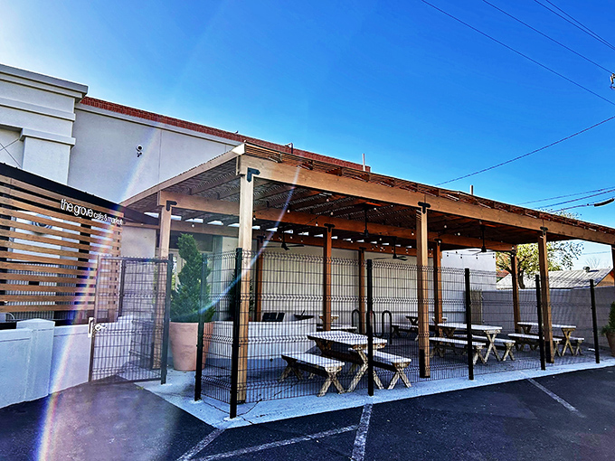 The wooden slat exterior of The Grove isn't just stylish&mdash;it's a preview of the warmth waiting inside, like a delicious secret the building can barely contain.