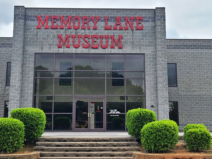 The unassuming exterior of Memory Lane Museum holds treasures that would make any car enthusiast's heart race like a souped-up V8.