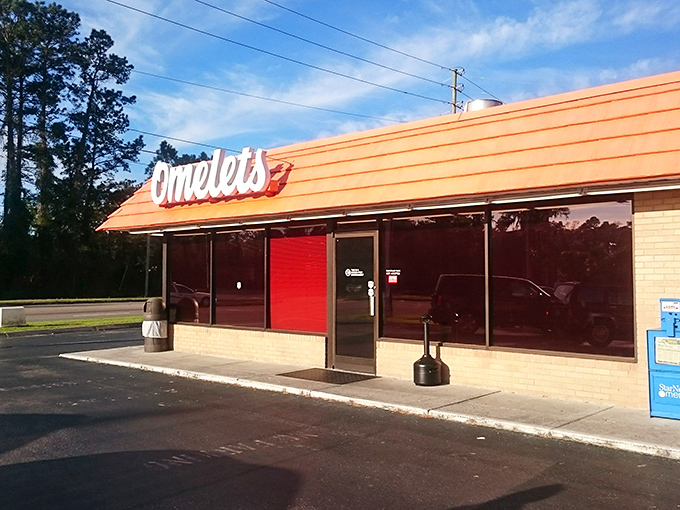 The iconic orange roof of Goody Goody Omelet House stands out like a breakfast lighthouse guiding hungry souls to their morning salvation.
