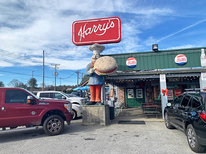 The roadside charm of Harry's comes complete with whimsical statues &ndash; including a chef pig holding a burger and that iconic ice cream cone beckoning hungry travelers. 
