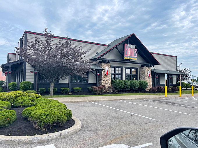The barbecue beacon of Grove City stands ready to welcome hungry pilgrims with its rustic stone facade and signature red roof.