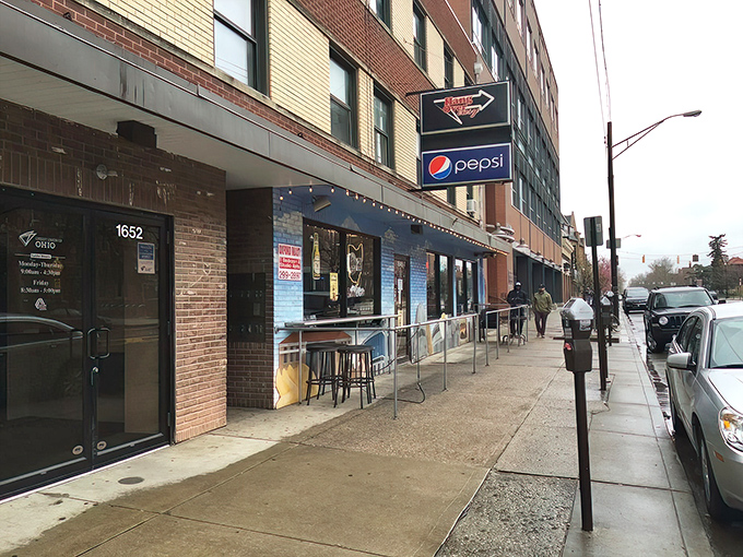 The bright red door and sunny yellow windows of Hang Over Easy beckon like a breakfast lighthouse on Neil Avenue, promising salvation for hungry souls.
