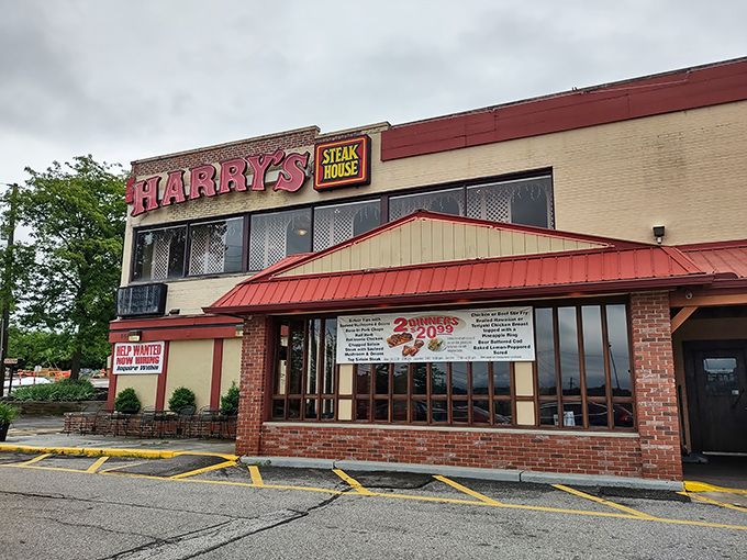 Harry's bold red signage stands like a beacon for hungry travelers, promising steak salvation in an unassuming strip mall setting.