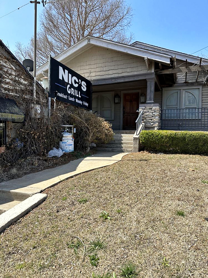 The unassuming exterior of Nic's Grill looks like any other house on the block&mdash;until you spot that sign promising burger nirvana inside.