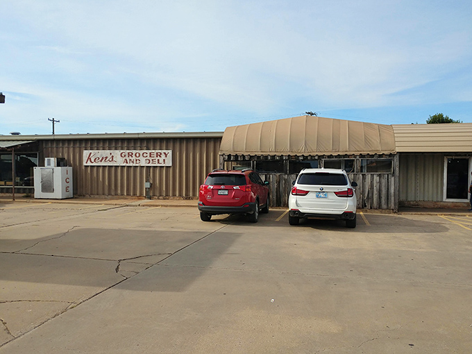 The unassuming exterior of Ken's Steak and Ribs proves the old adage: never judge a restaurant by its corrugated metal siding. Culinary treasures often hide in plain sight.