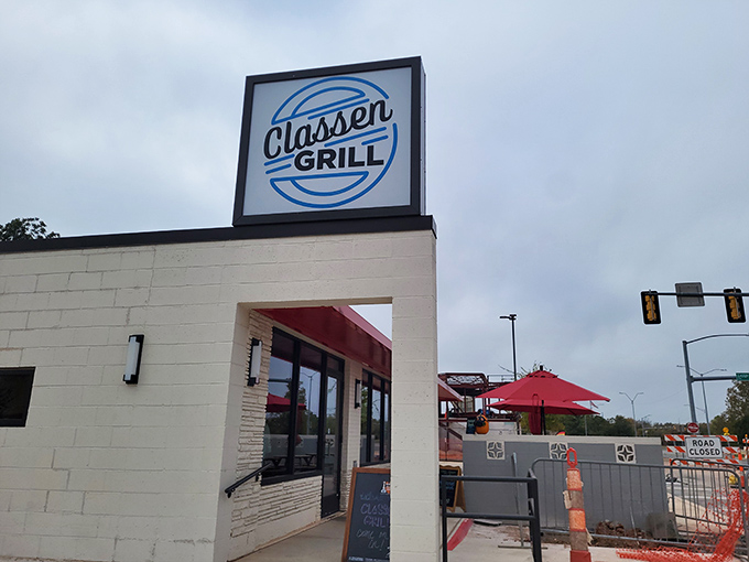 The unassuming white exterior of Classen Grill proves once again that culinary treasures often hide in plain sight at busy Oklahoma City intersections.