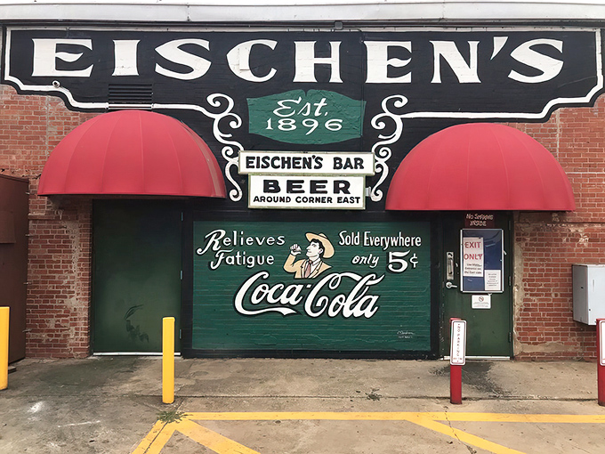 The unassuming brick fa&ccedil;ade of Eischen's Bar stands like a culinary lighthouse in Okarche, beckoning hungry travelers with its iconic green awning.