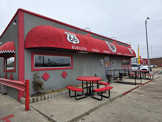 The classic Route 66 red awnings of Sid's Diner aren't just eye-catching&mdash;they're practically a beacon calling hungry travelers home to burger paradise.