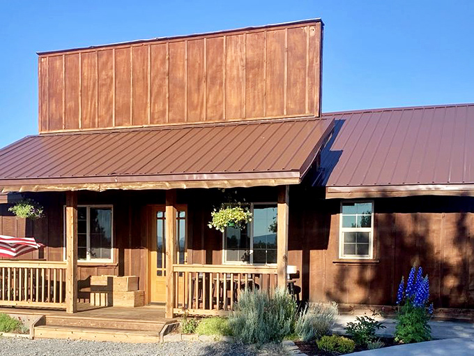 The rustic "HOWDY" welcome sign stands as your first clue that you've left civilization behind and entered steak paradise. 
