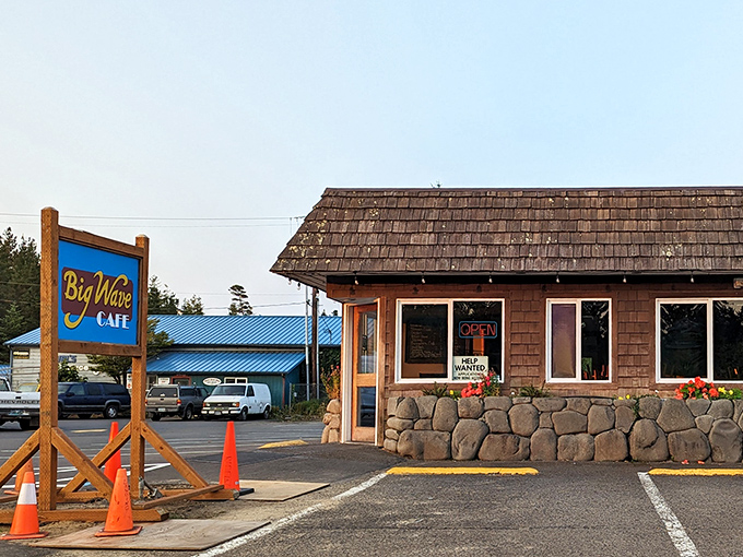 The unassuming exterior of Big Wave Caf&eacute; stands like a coastal secret &ndash; wooden shingles, blue trim, and a simple sign promising oceanic delights within.