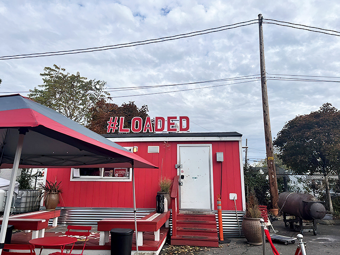 The fire-engine red food cart stands like a beacon of culinary promise, drawing hungry pilgrims from across Oregon to its flavorful sanctuary.