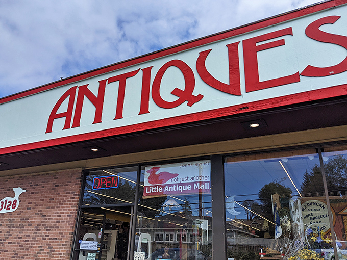 The unassuming exterior of Little Antique Mall belies the wonderland within. That bold red "ANTIQUES" sign is like a beacon to treasure hunters on Highway 101.