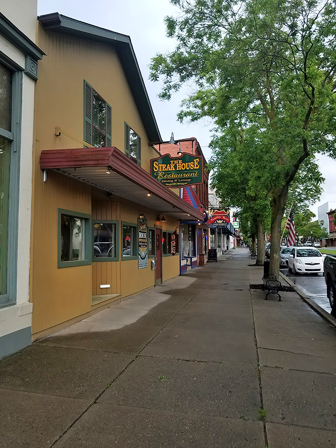 Classic Americana beckons with that iconic green sign promising carnivorous delights. Outdoor tables invite you to people-watch on Wellsboro's charming Main Street.