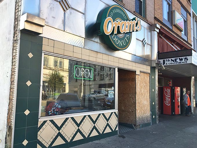 The unassuming storefront of Oram's belies the sugary magic happening inside. Like Clark Kent's phone booth, this place transforms ordinary mornings into extraordinary ones.