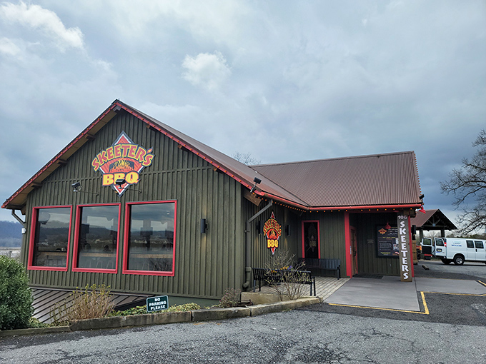 Skeeter's green exterior glows at dusk like a barbecue beacon, calling hungry travelers home with its rustic charm and promise of smoky delights. 
