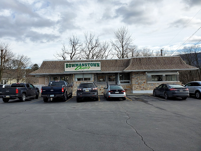 The exterior's stone facade and classic green signage stand as Pennsylvania's answer to the Bat Signal - comfort food headquarters.
