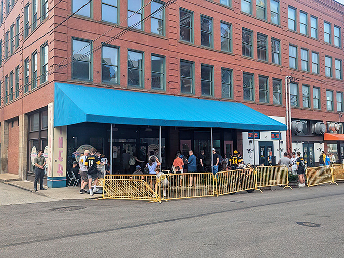 The iconic teal awning of Pamela's Diner beckons hungry Pittsburghers like a breakfast lighthouse guiding ships to delicious shores. 