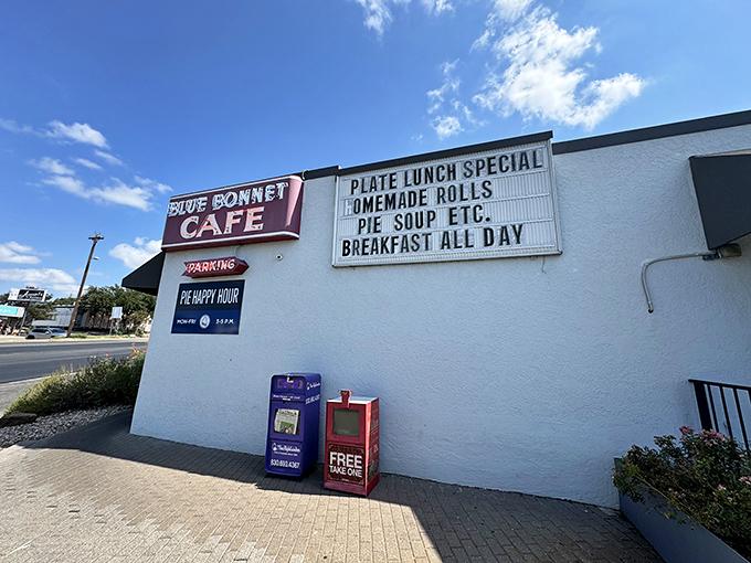 The white exterior with its classic blue and red signage isn't just a restaurant facade&mdash;it's a promise of comfort that's been kept for generations of Texans.