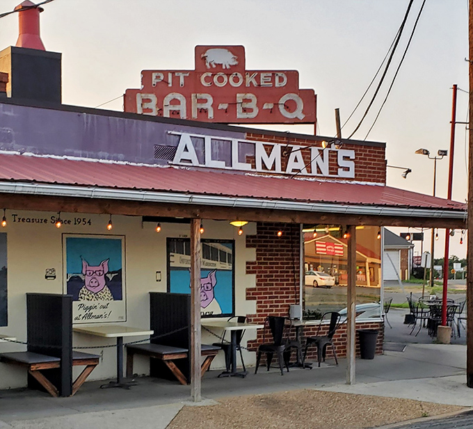 The iconic red chimney and vintage sign at Allman's have been beckoning hungry travelers since Eisenhower was signing bills. BBQ pilgrimage starts here.