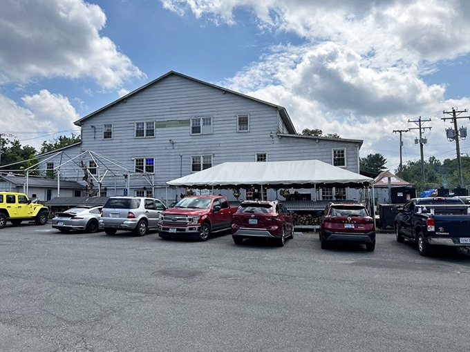 The white clapboard exterior of Monk's might seem unassuming, but those stacks of firewood tell you everything you need to know: smoke signals of deliciousness await inside.
