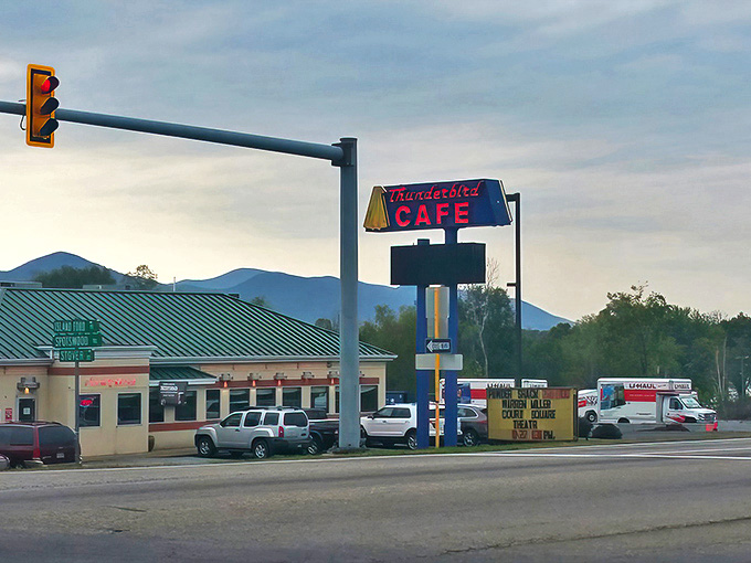 The unassuming exterior of Thunderbird Cafe stands like a beacon of breakfast hope, its neon sign promising delicious revelations within.