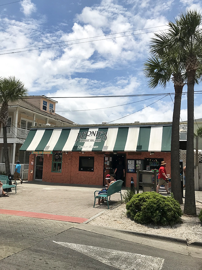 The unmistakable green fa&ccedil;ade of Bernie's with its jaunty striped awning&mdash;like a seafood speakeasy hiding in plain sight on Tybee Island.