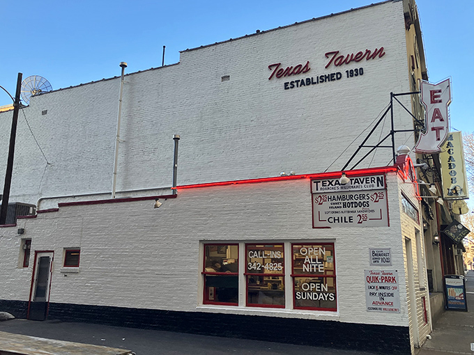 The iconic white brick exterior of Texas Tavern stands like a time capsule in downtown Roanoke, promising affordable eats and endless stories.