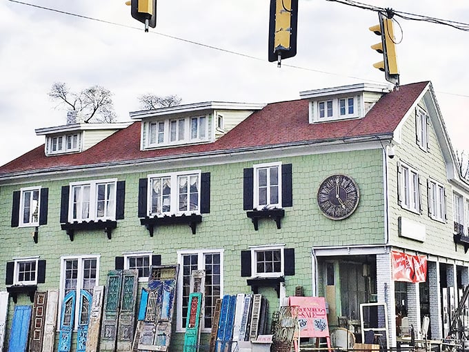 The unassuming facade of Old Lucketts Store beckons like a vintage postcard come to life, complete with that signature red roof and welcoming porch steps.