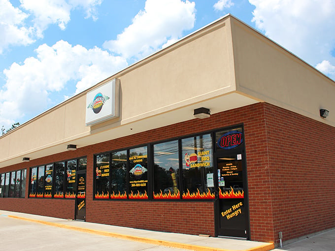 The flames painted along the storefront aren't just decoration—they're a warning to your diet plans. Ridge View BBQ's exterior promises smoky delights within.