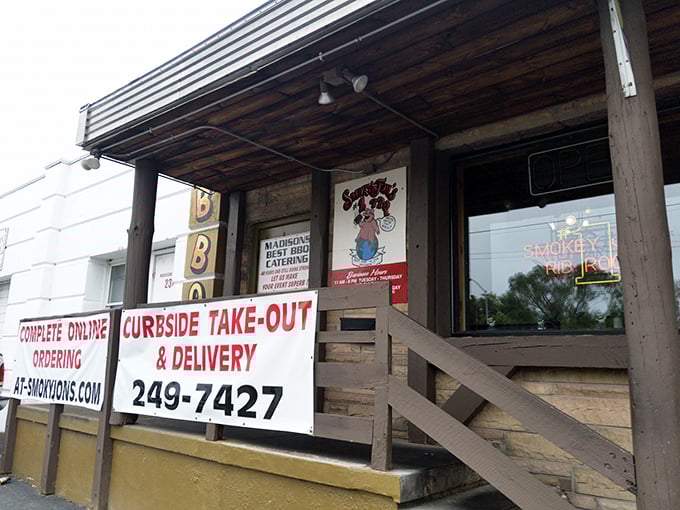 The unassuming exterior of Smoky Jon's proudly declares itself "Madison's All-Time BBQ King" &ndash; a bold claim backed by decades of smoke-infused excellence.