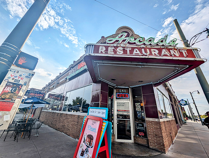 That iconic red exterior isn't just a building&mdash;it's a time machine disguised as Memphis's oldest caf&eacute;. The neon practically winks at you.