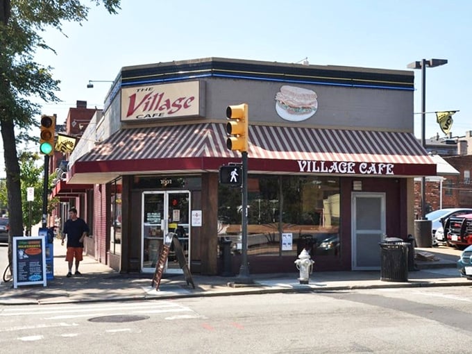 The corner spot that launched a thousand breakfast dreams. Village Cafe's iconic exterior stands like a beacon of hope for the hungry masses of Richmond.