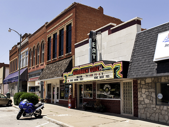 Highway 77 cuts through Perry like a ribbon unwrapping a gift, inviting travelers to slow down and discover what lies beyond the traffic light.