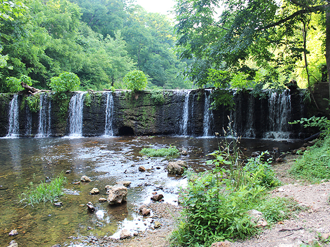 The spectacular 77-foot waterfall plunges through limestone cliffs at Natural Falls, creating an enchanting scene that feels more Pacific Northwest than Oklahoma. 