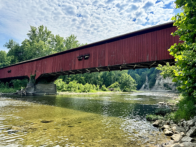 This historic covered bridge spans Sugar Creek, offering another glimpse of Indiana's timeless beauty that complements your wilderness adventure perfectly.