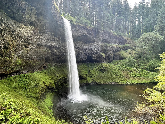 Walking behind South Falls feels like stepping into nature's backstage pass &ndash; where the thundering curtain of water creates its own microclimate of mist and wonder.