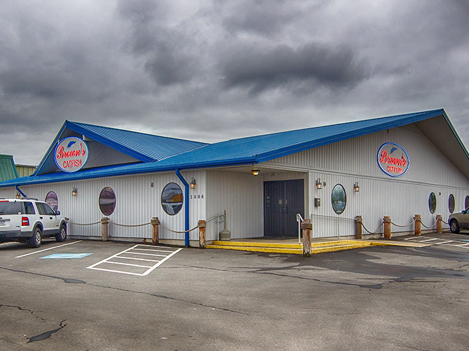 The blue-roofed temple of fried delights stands proudly against the Arkansas sky, a beacon calling hungry travelers from miles around.