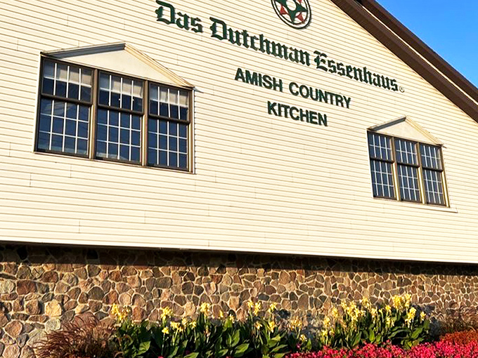 The iconic white facade of Das Dutchman Essenhaus stands proudly against the Indiana sky, promising comfort food that'll make your cardiologist wince and your soul sing.