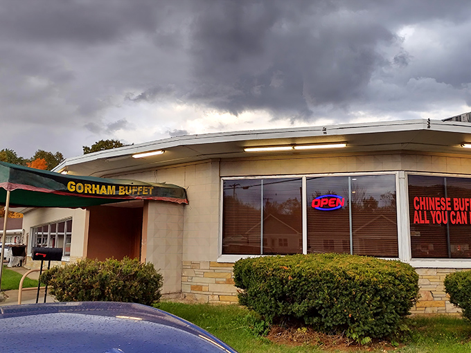 The Dynasty Buffet's exterior stands resolute against New Hampshire's moody skies, a beacon of culinary comfort for hungry travelers and locals alike.